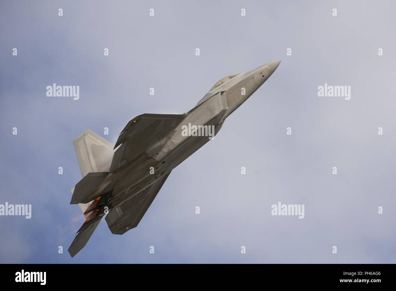 An F-22 Raptor takes off during the Joint Forces Demonstration at the ...