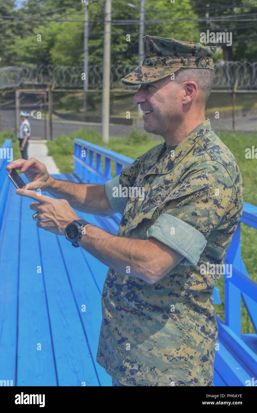 SgtMaj Anthony Spadaro snaps a photo at the bridge where President Moon ...