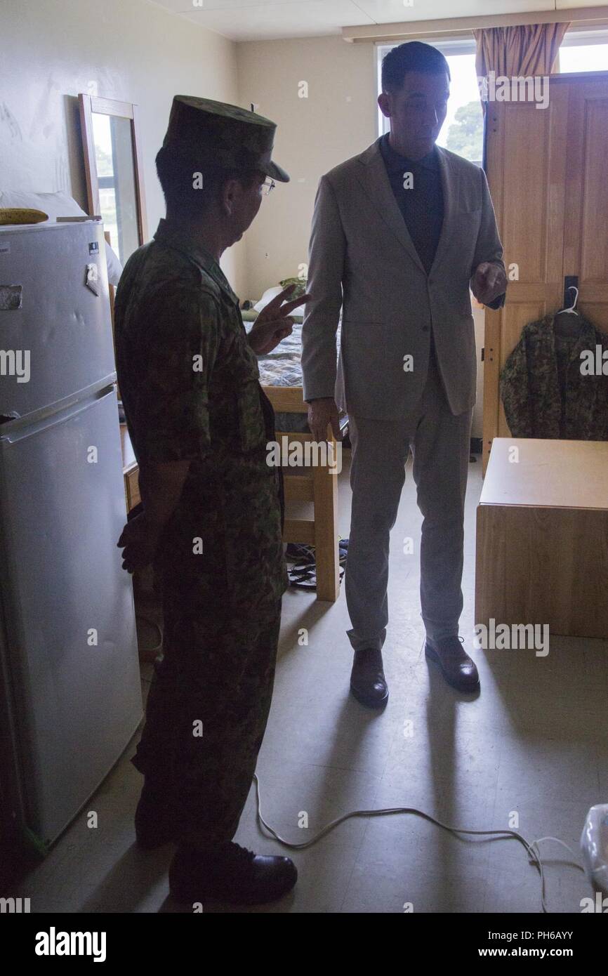 CAMP HANSEN, OKINAWA, Japan – Richard Ryan shows visiting Japan Ground ...