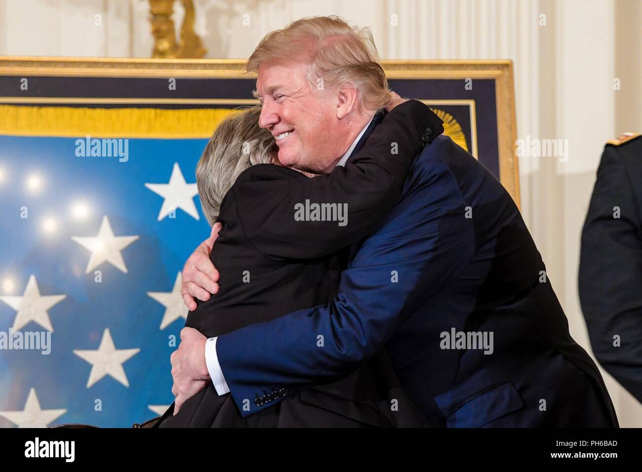 President Donald J. Trump embraces Pauline Lyda Wells Conner, the ...
