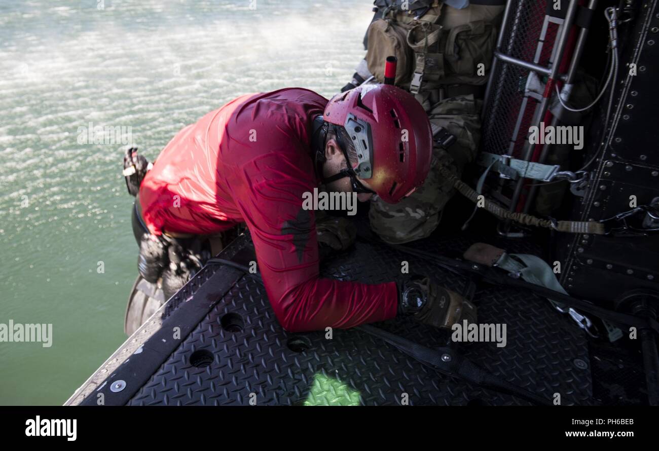 Senior Airman George Ploetz, 308th Rescue Squadron pararescueman ...