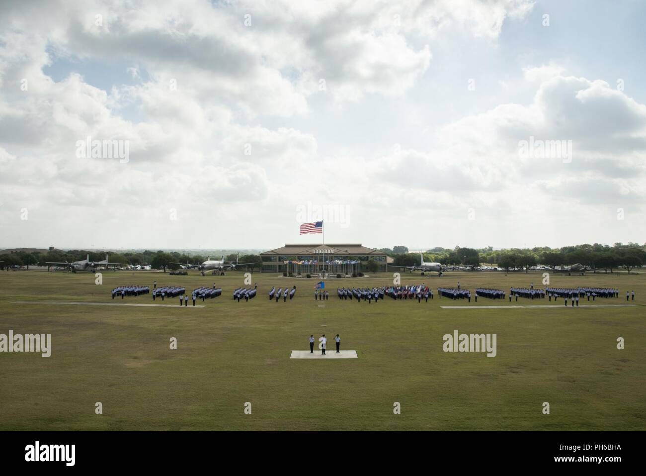 U.S. Air Force Airman stand in formation during their basic military ...