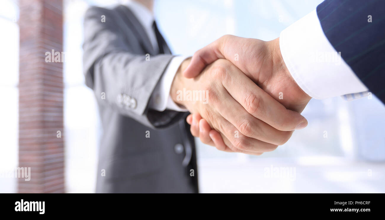 Diverse male friends shaking hands hi-res stock photography and images ...