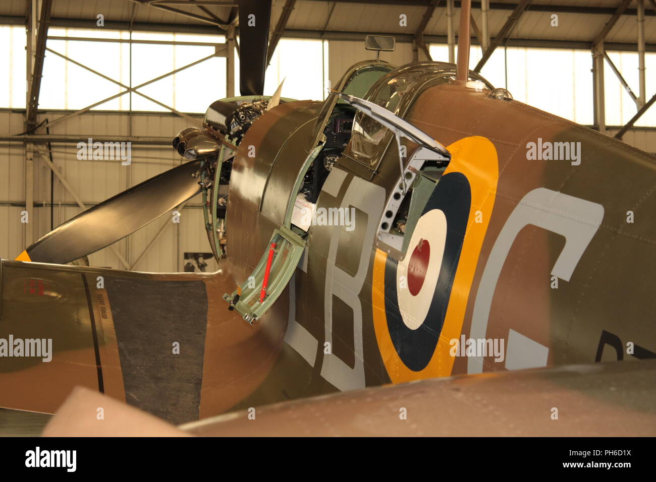 Spitfire P7350 in hangar Stock Photo - Alamy