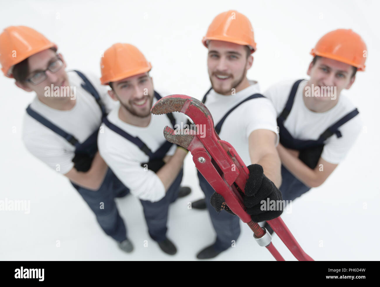 view from the top.the team of plumbers showing gas keys Stock Photo - Alamy