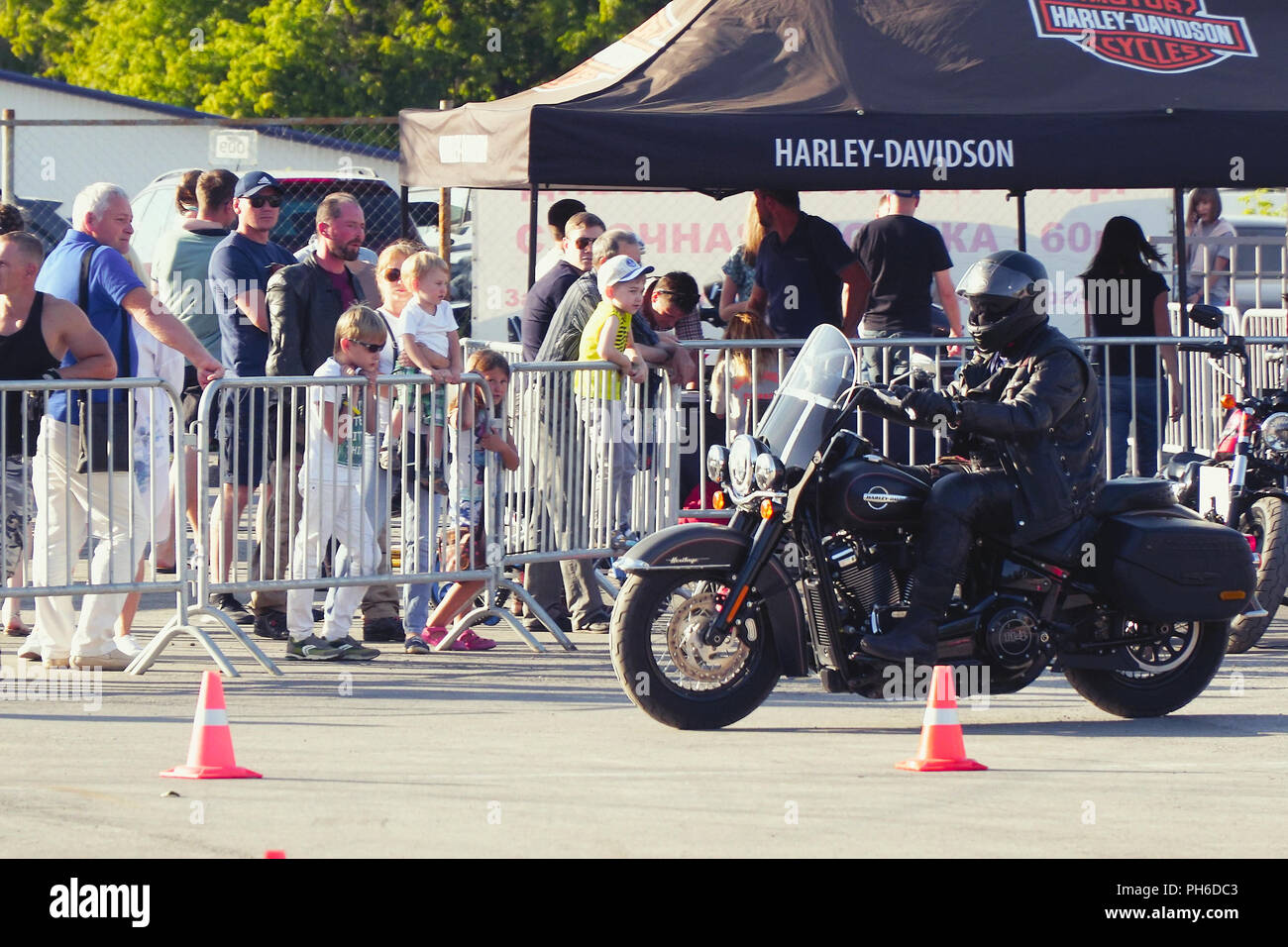 Motorcyclist in a helmet riding a motorcycle Harley Davidson Stock ...