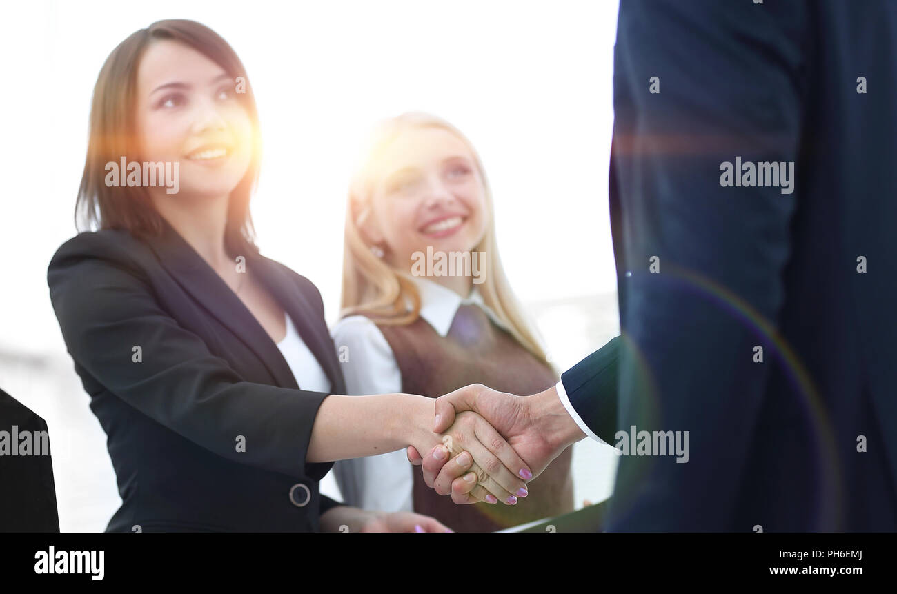 business colleagues shaking hands after a successful presentation Stock ...