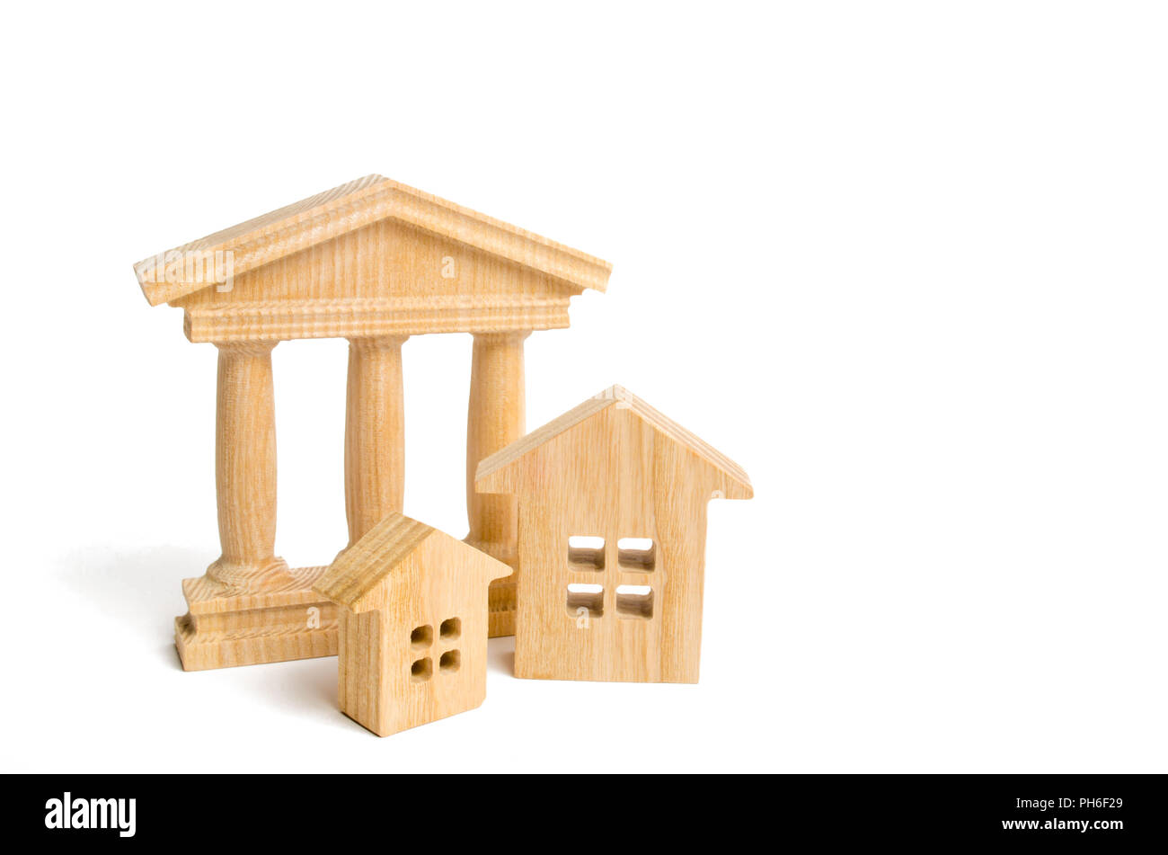Wooden figures of buildings and a pantheon. Concept of urban structure ...
