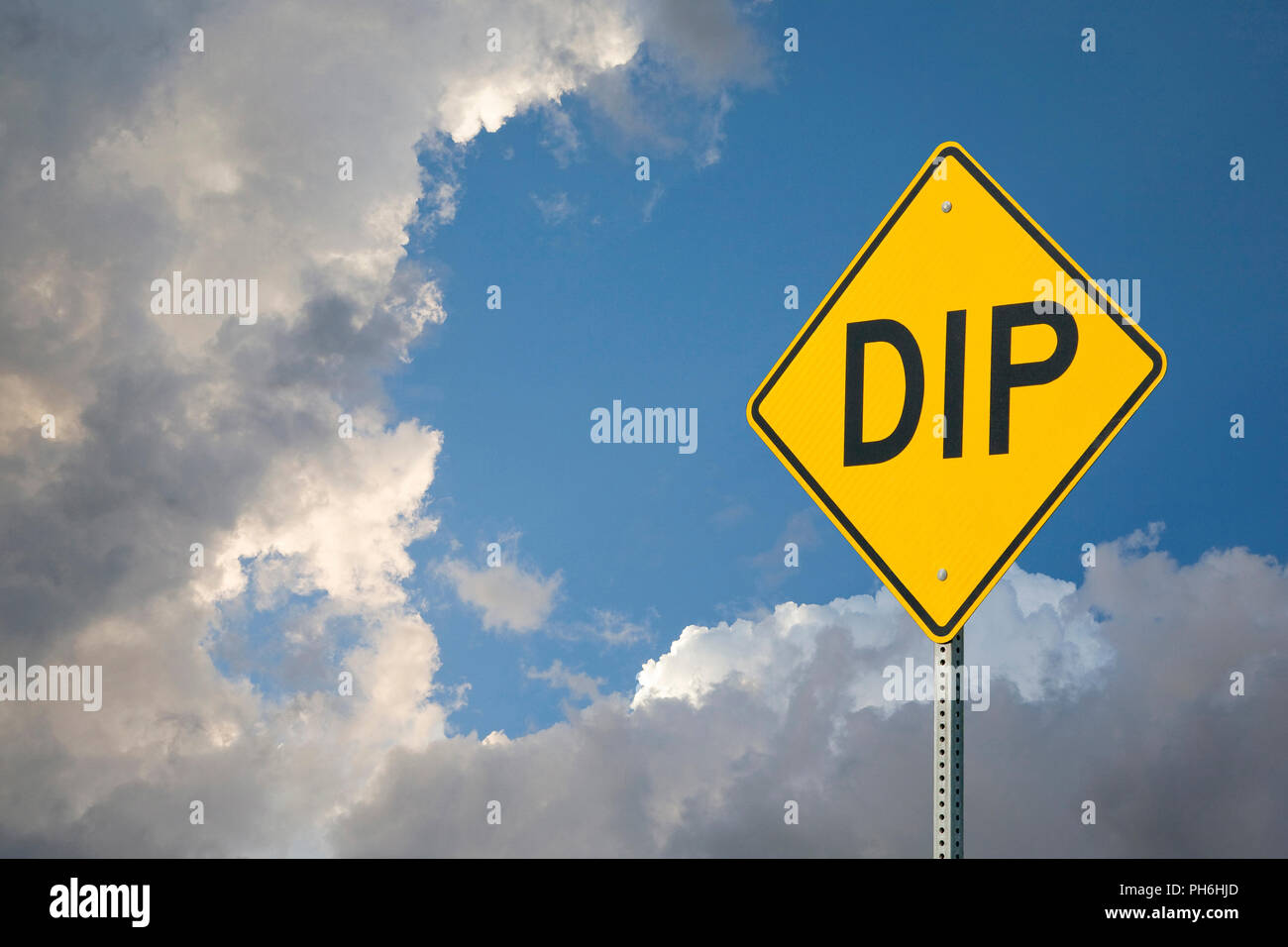 Dip Sign With Blue Sky And Clouds Stock Photo - Alamy