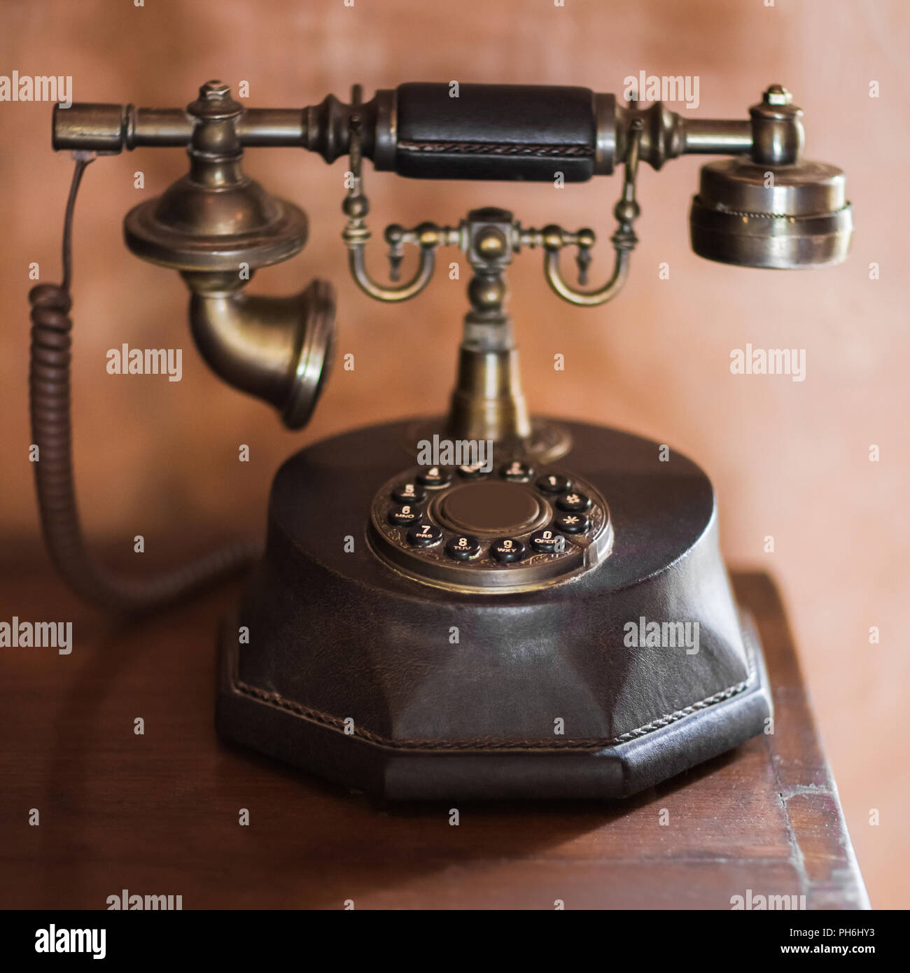 Old vintage antique bronze phone Stock Photo - Alamy
