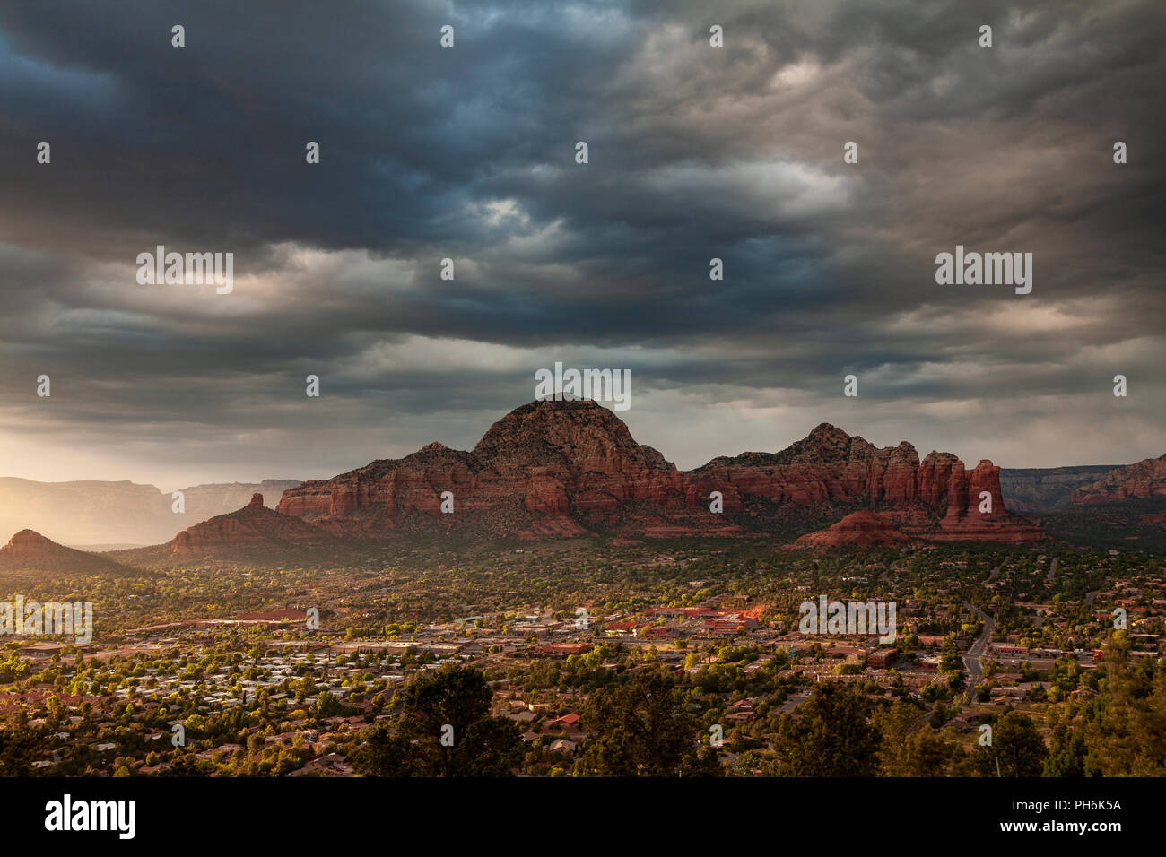 Sedona and surrounding sandstone buttes at sunset with clouds, Arizona ...