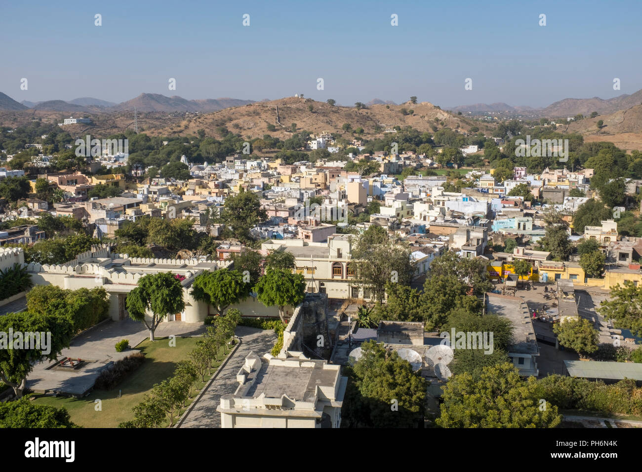 Delwara village in the Aravalli Hills, as seen from the RAAS Devigarh ...