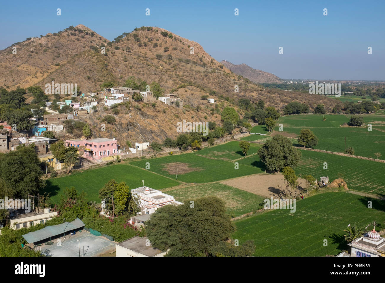 The fields surrounding Delwara village in the Aravalli Hills, as seen ...