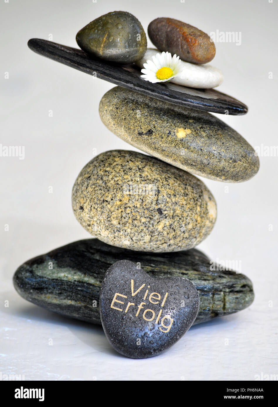 Wellness stones Balance Flower Stock Photo - Alamy