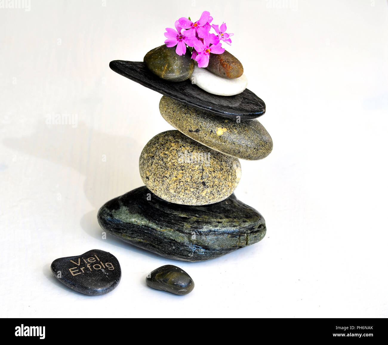 Wellness stones Balance Flower Stock Photo - Alamy