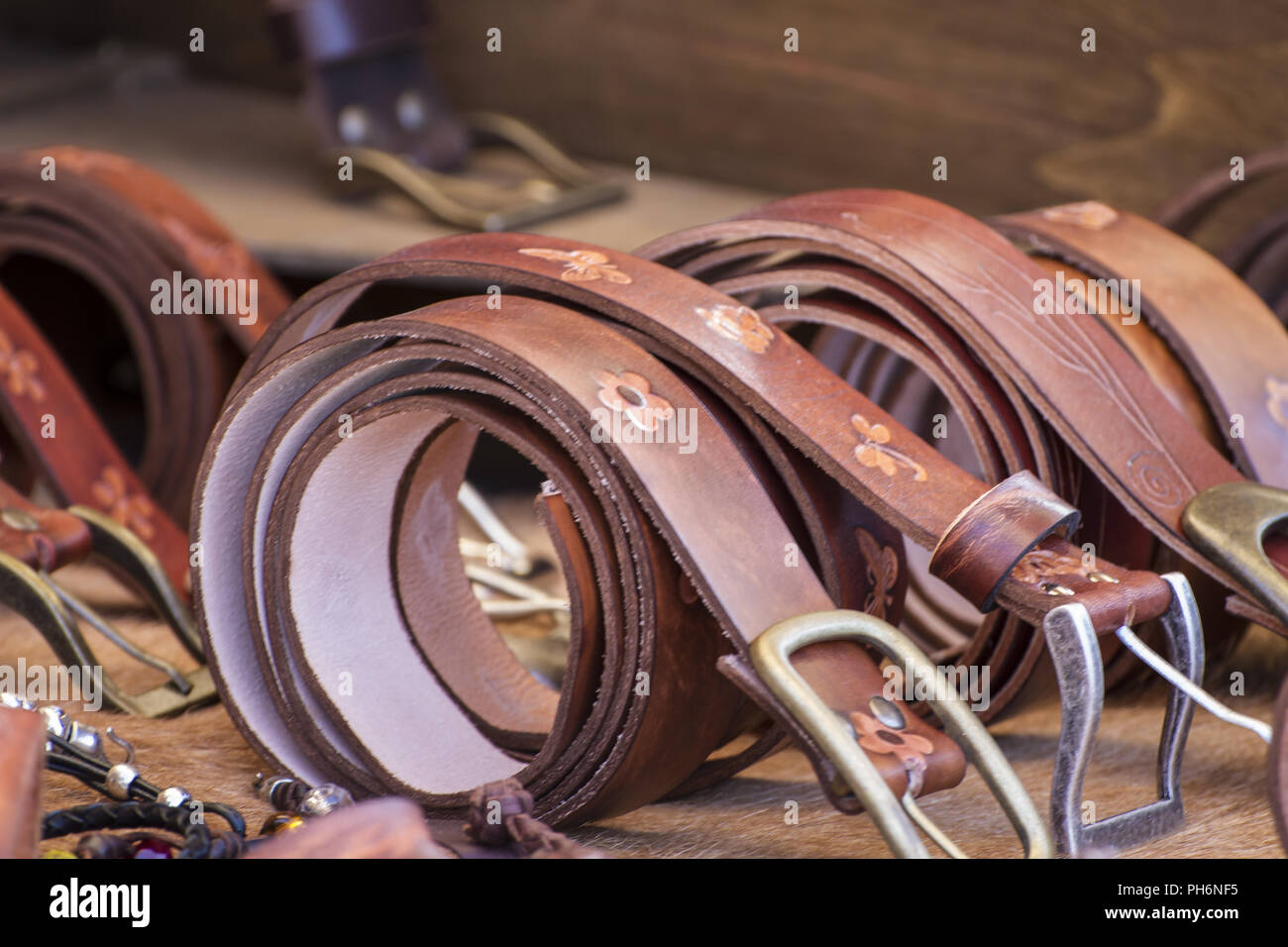 Store handmade leather belts, spanish medieval fair Stock Photo - Alamy