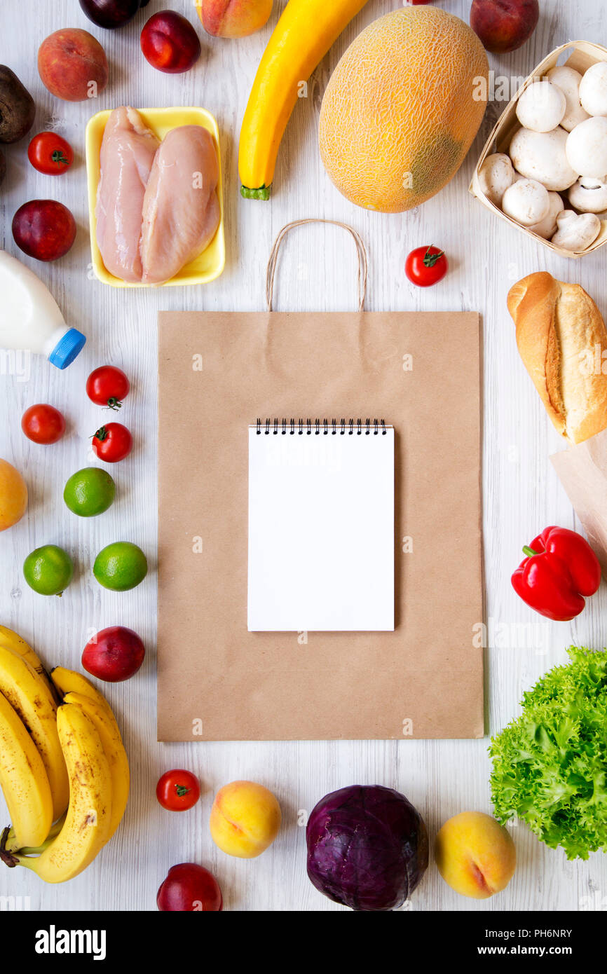 Shopping concept. Set of various groceries with paper bag and blank ...