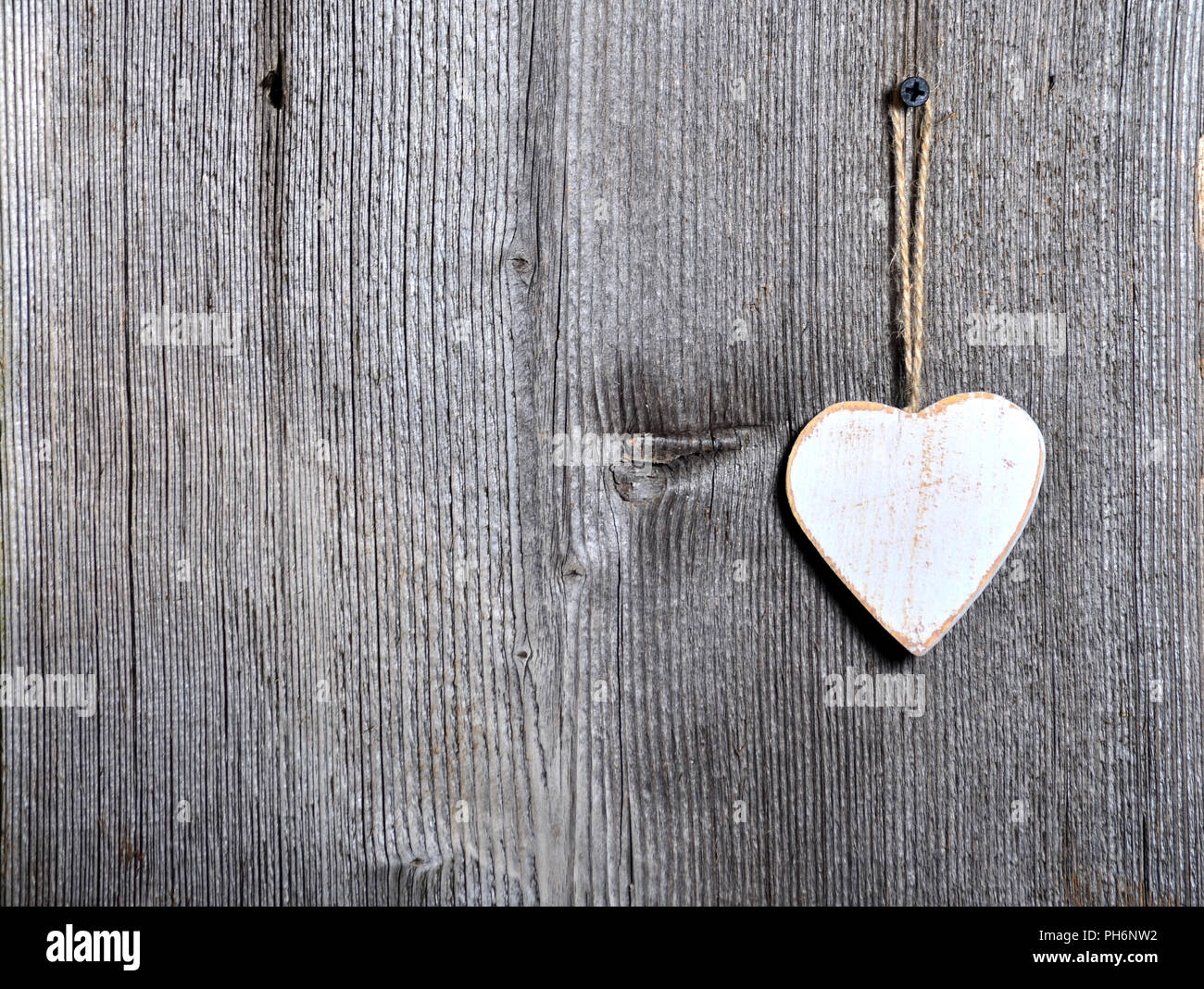 Wooden heart love background Stock Photo - Alamy