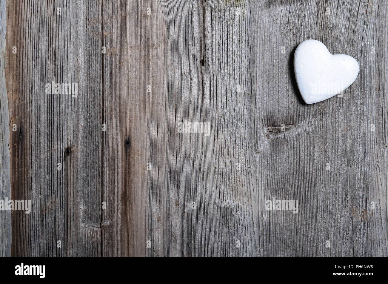 Wooden heart love background Stock Photo - Alamy