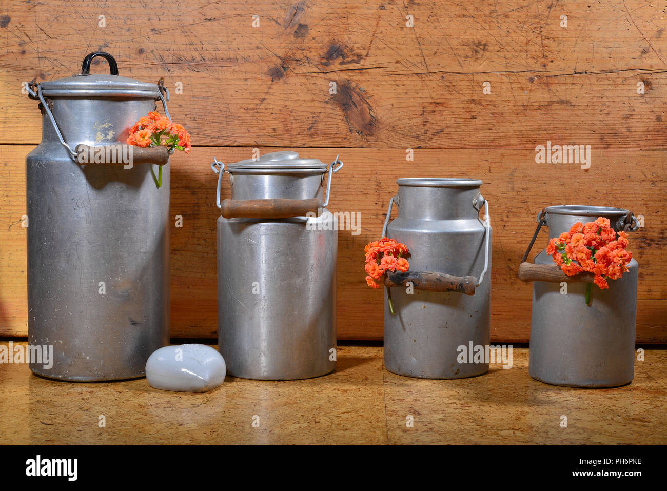 Junk milk jug stoneware pots Stock Photo - Alamy