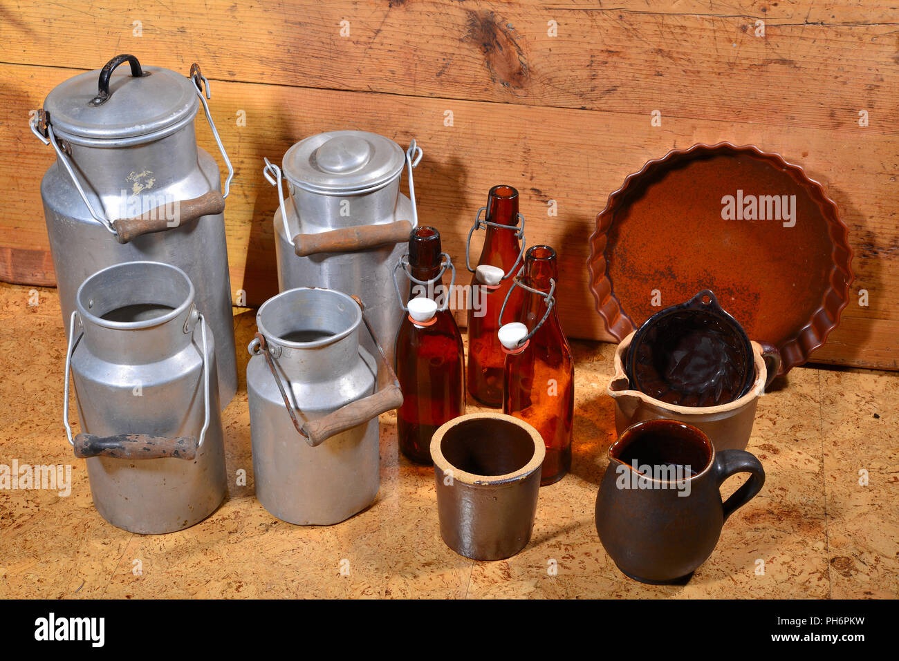 Junk milk jug stoneware pots Stock Photo - Alamy