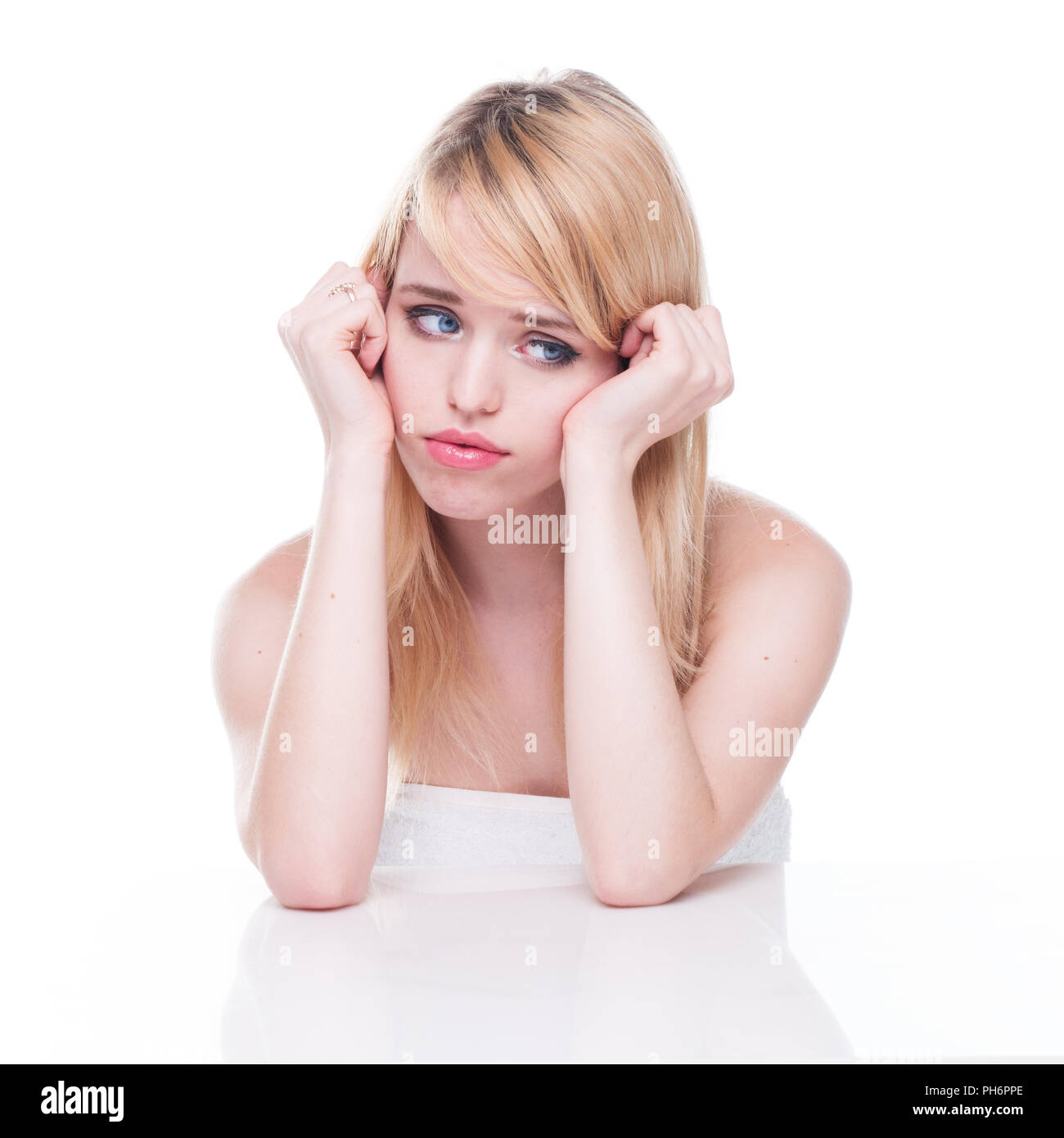 Girl with head in hands sad hi-res stock photography and images - Alamy