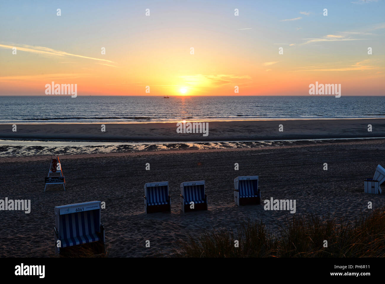 Sunset on the beach Sylt holidays Stock Photo - Alamy