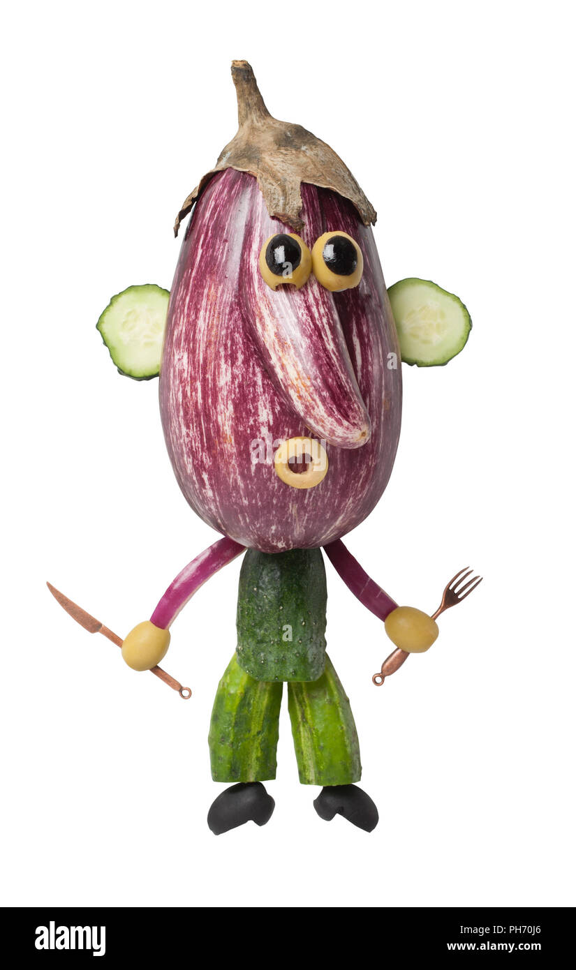 Funny vegetable man holding fork and knife Stock Photo - Alamy
