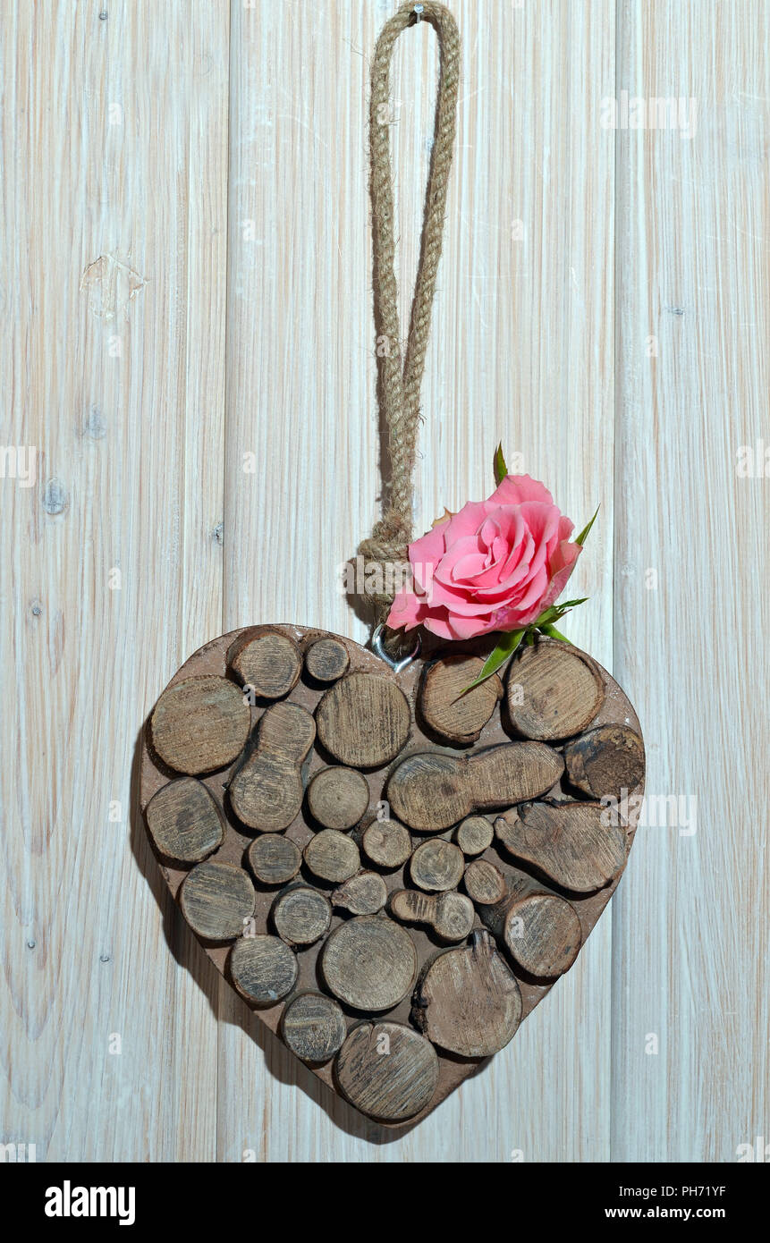 Wooden heart love background Stock Photo - Alamy