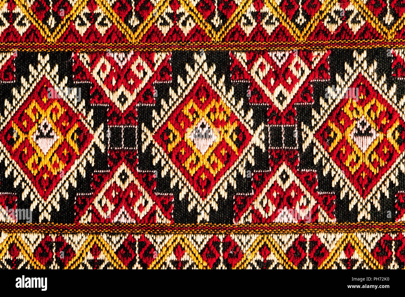 Red ancient thai woven cloth Stock Photo - Alamy