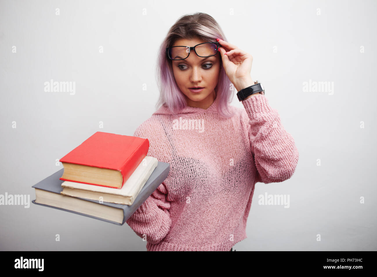 Student. Young woman with books. Student girl with a stack of books ...