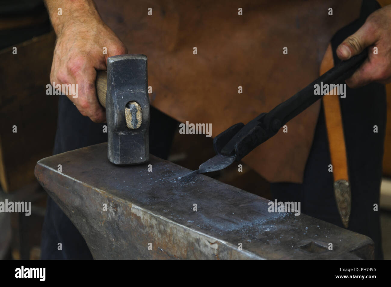 Old crafts, blacksmith at work Stock Photo - Alamy