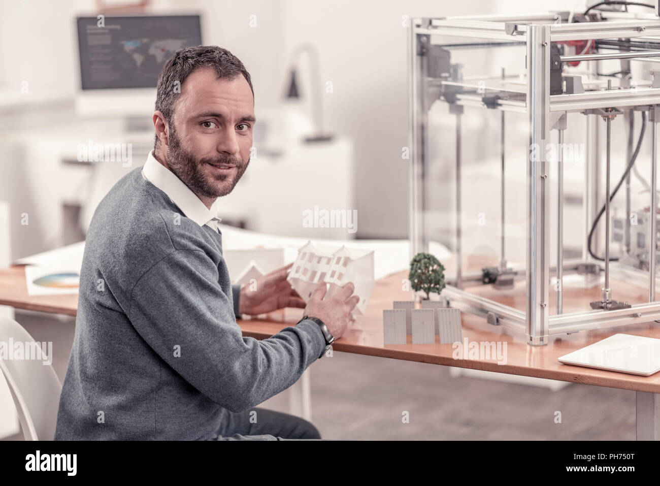 Talented adult positive designer creating landscape design Stock Photo ...