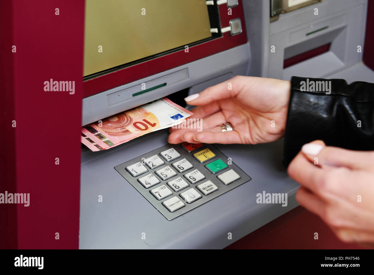 Atm withdrawal woman hi-res stock photography and images - Alamy