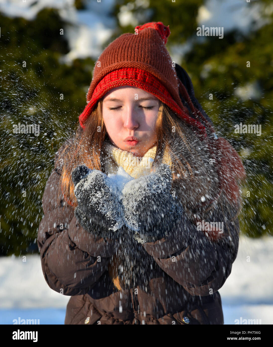 Funny girl in snow winter Stock Photo - Alamy