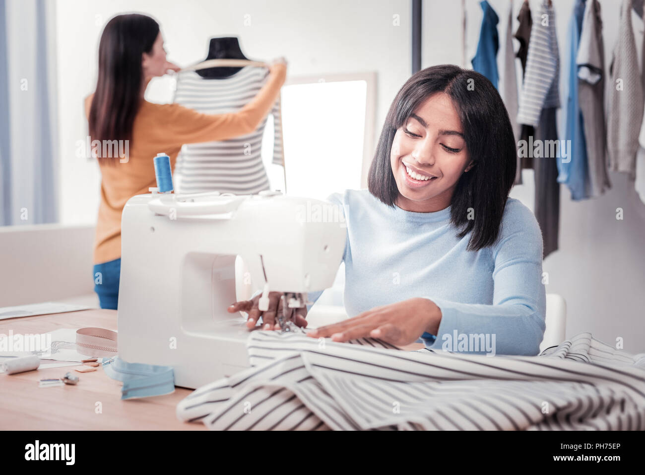 Tailors sewing hi-res stock photography and images - Alamy