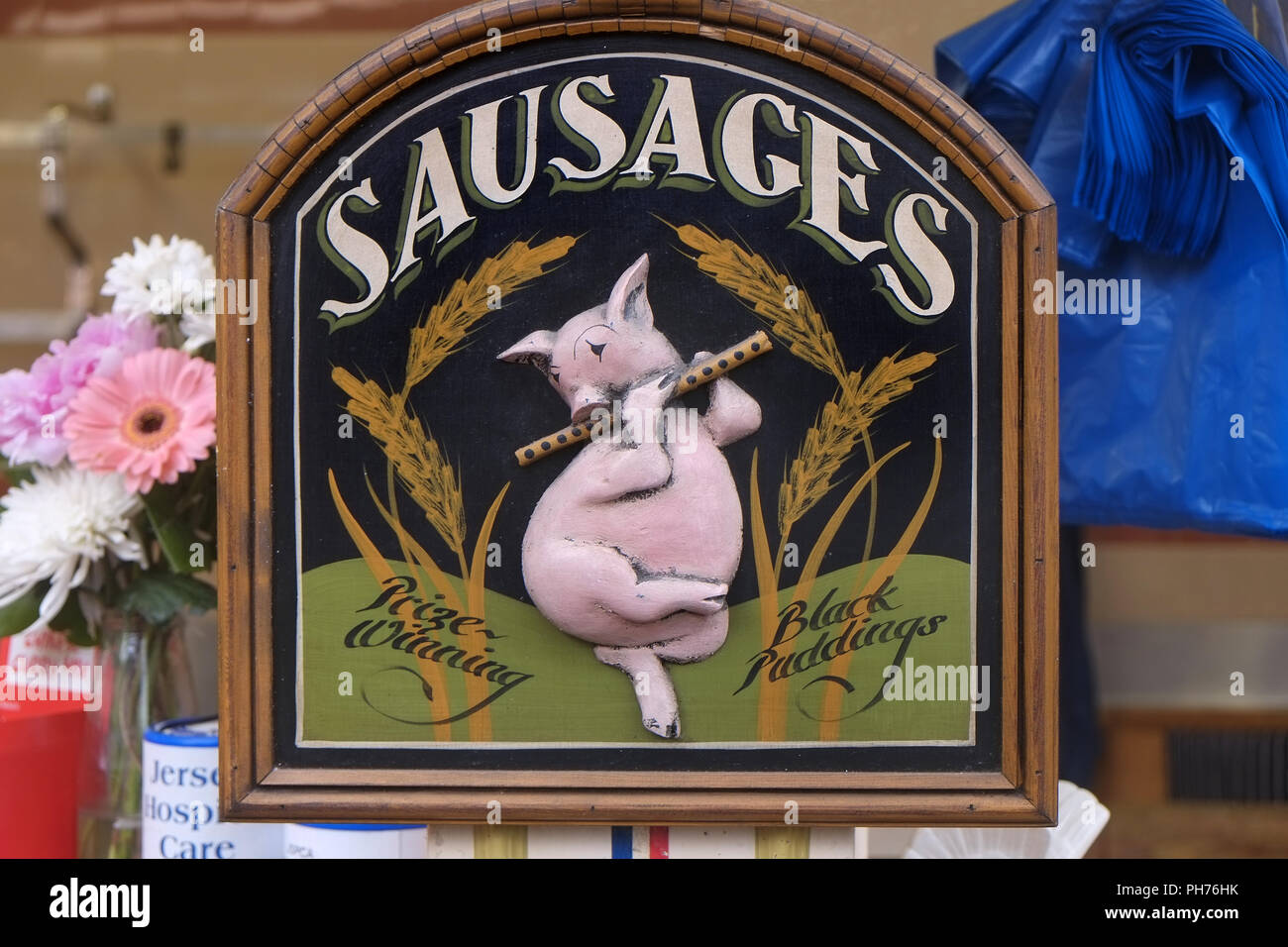 Advertising sign of a butcher shop Stock Photo - Alamy