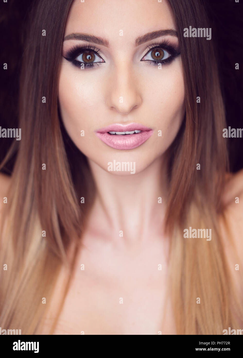 Beautiful woman face close up studio Stock Photo - Alamy