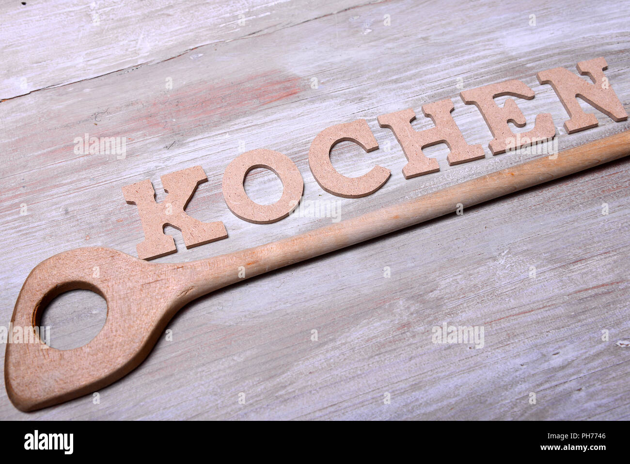 Cooking wooden spoon background Stock Photo - Alamy