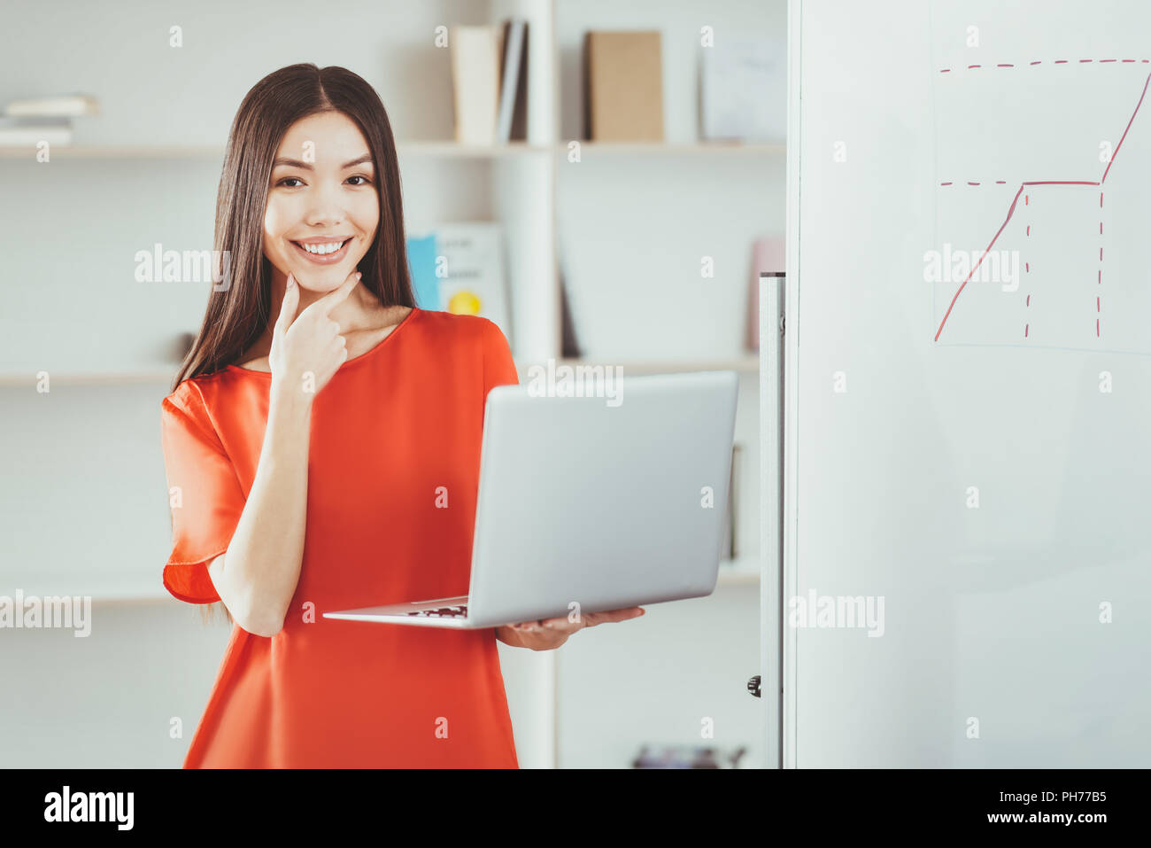 Smart intelligent student standing in the classroom Stock Photo - Alamy