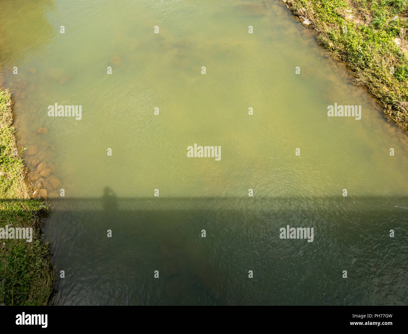 A silhouette of photographer on the water, Yangjae stream, Seoul, Korea ...