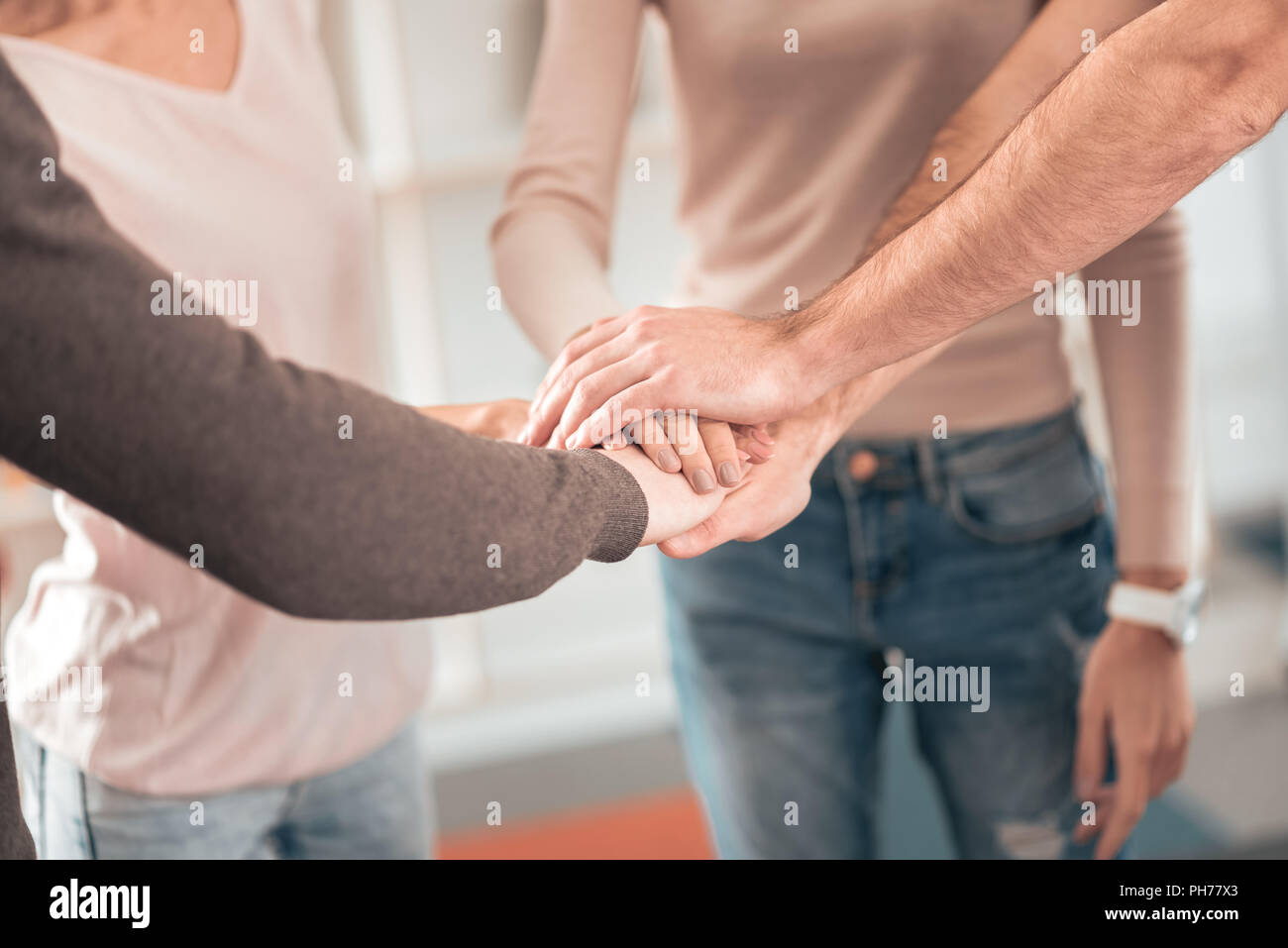 Group women held hands hi-res stock photography and images - Alamy