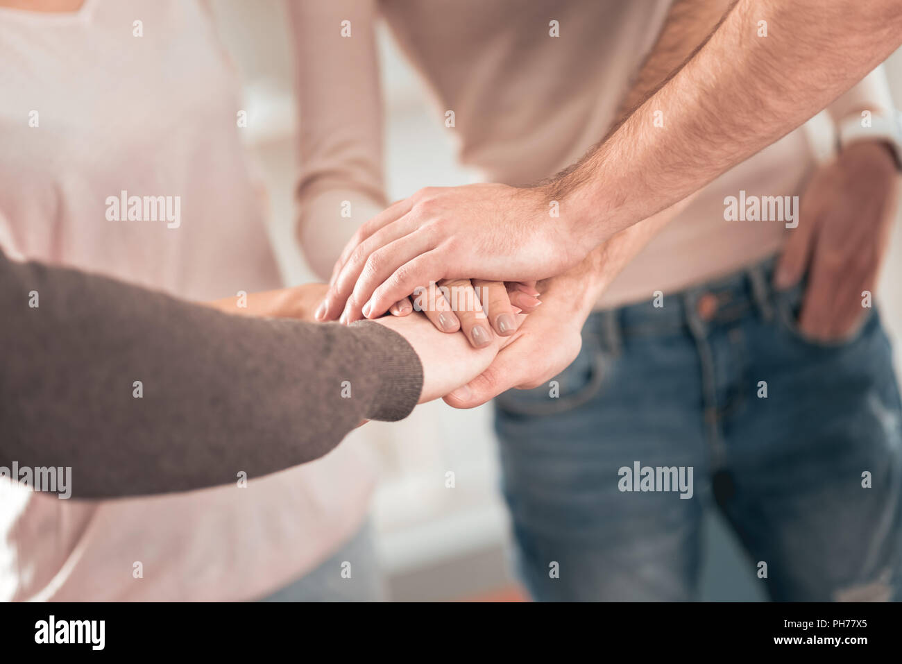 Group women held hands hi-res stock photography and images - Alamy