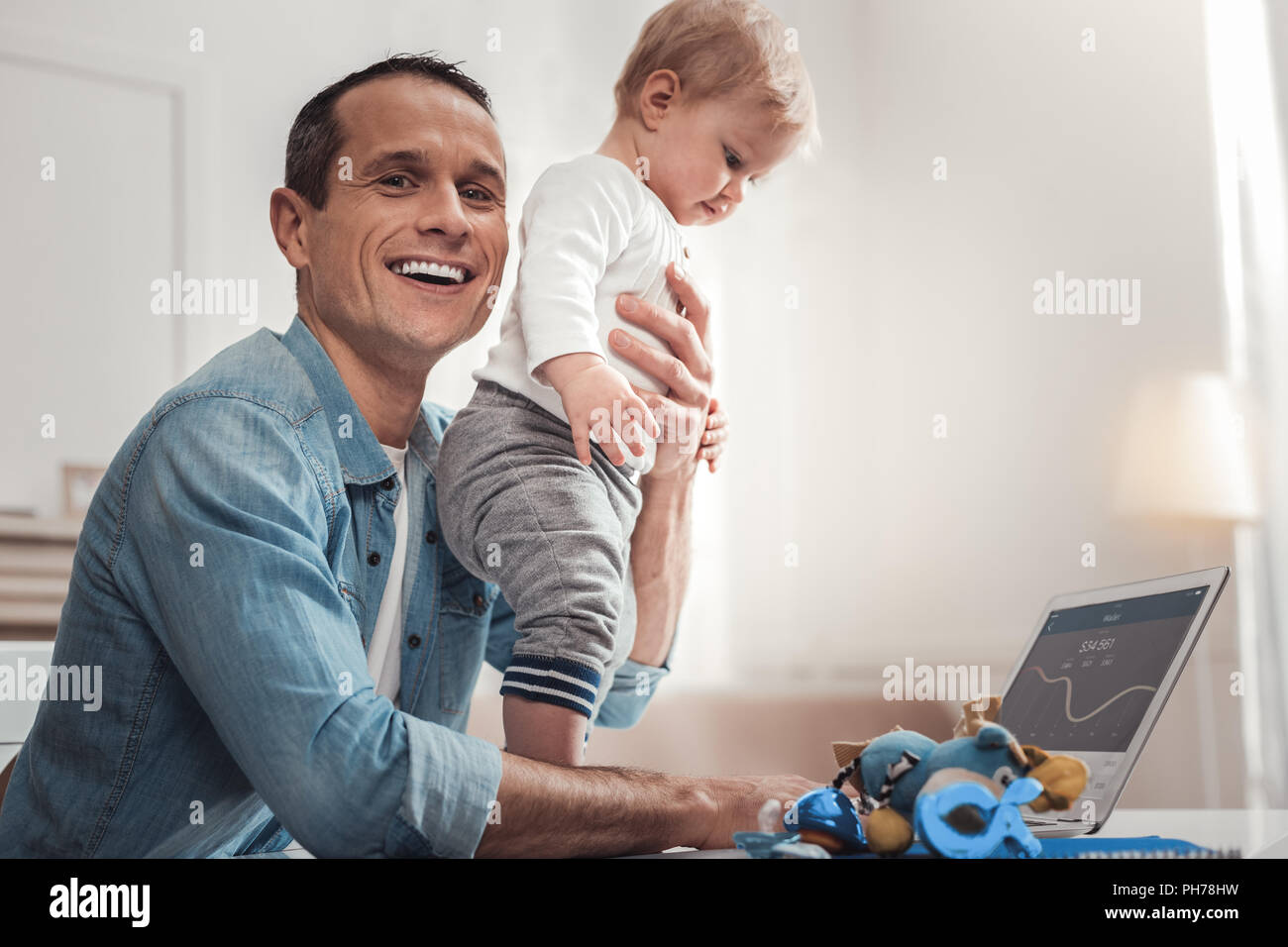 Positive cheerful man smiling Stock Photo - Alamy