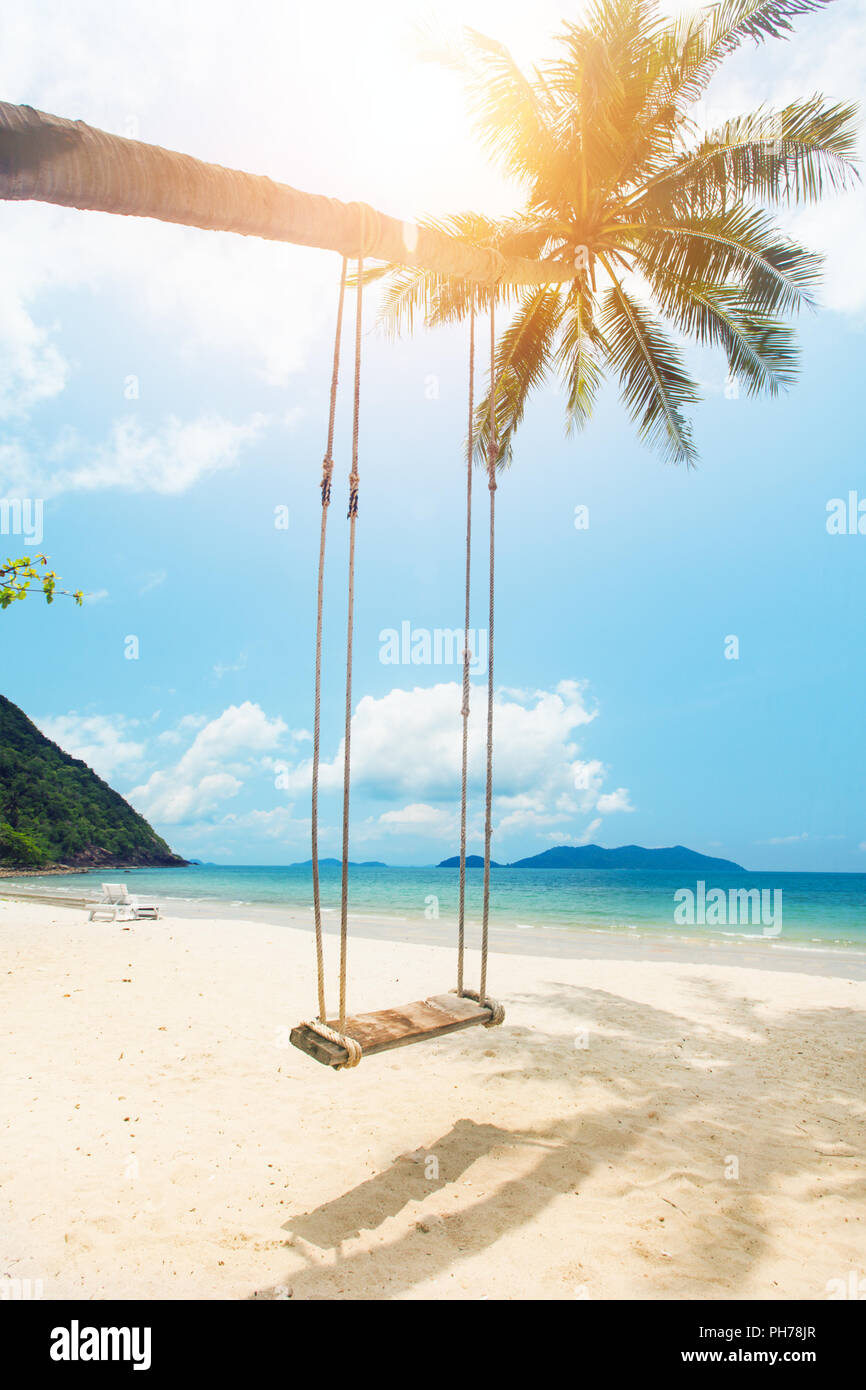 Beautiful tropical island beach with coconut palm trees and swing Stock ...