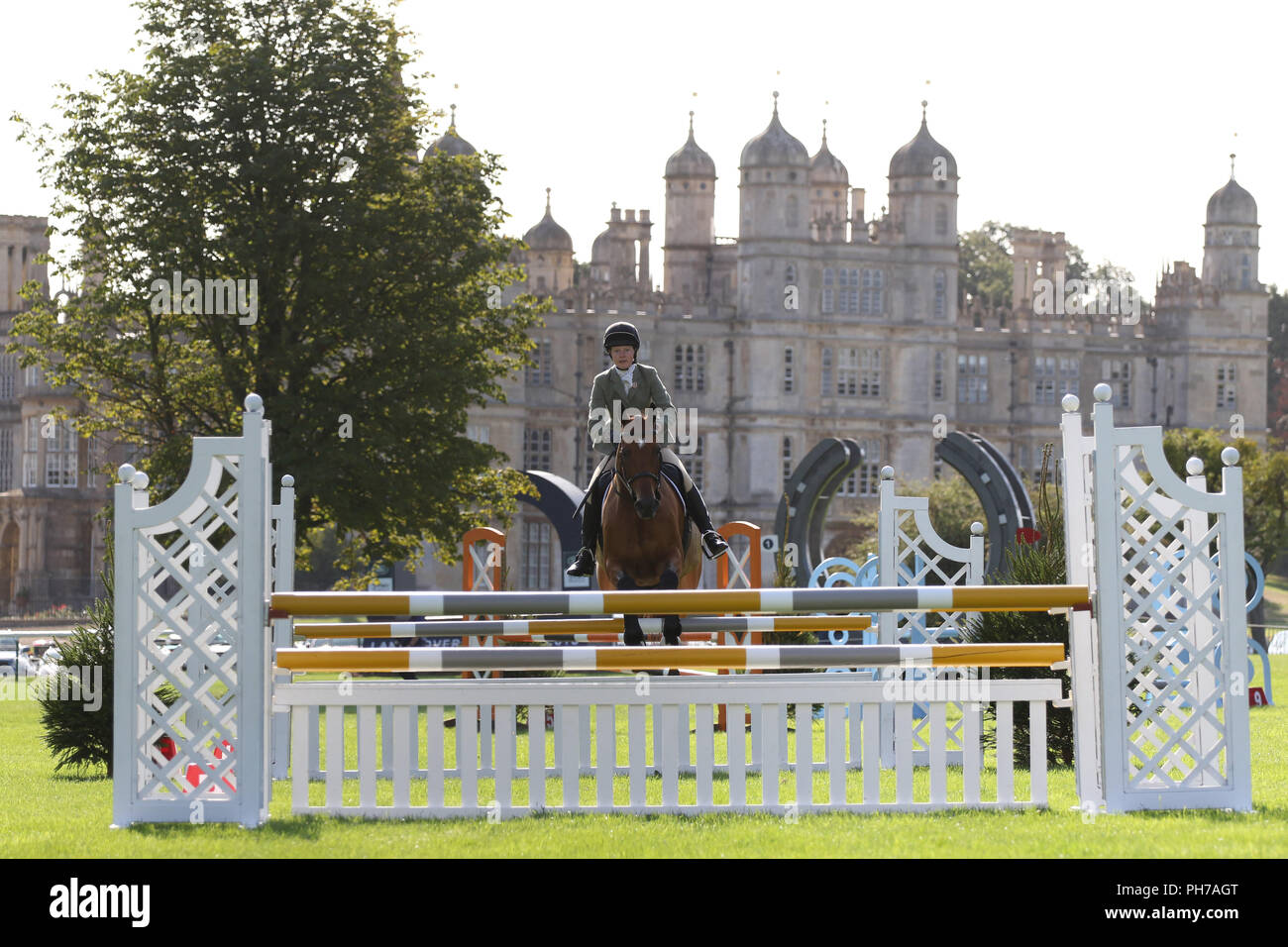 Stamford, UK. 30th Aug 2018. A competitor in the Pony Club Team Jumping ...