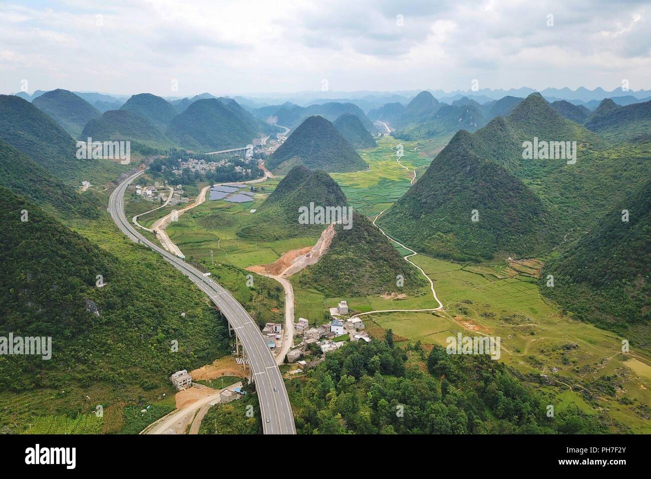 Zhenfeng. 30th Aug, 2018. Aerial photo taken on Aug. 30, 2018 shows the ...