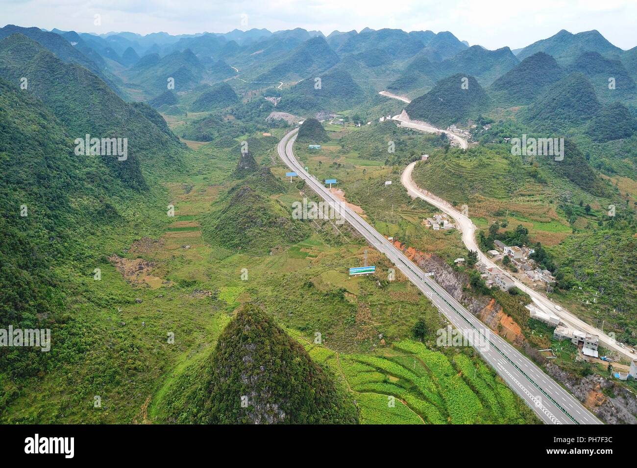 Zhenfeng. 30th Aug, 2018. Aerial photo taken on Aug. 30, 2018 shows the ...
