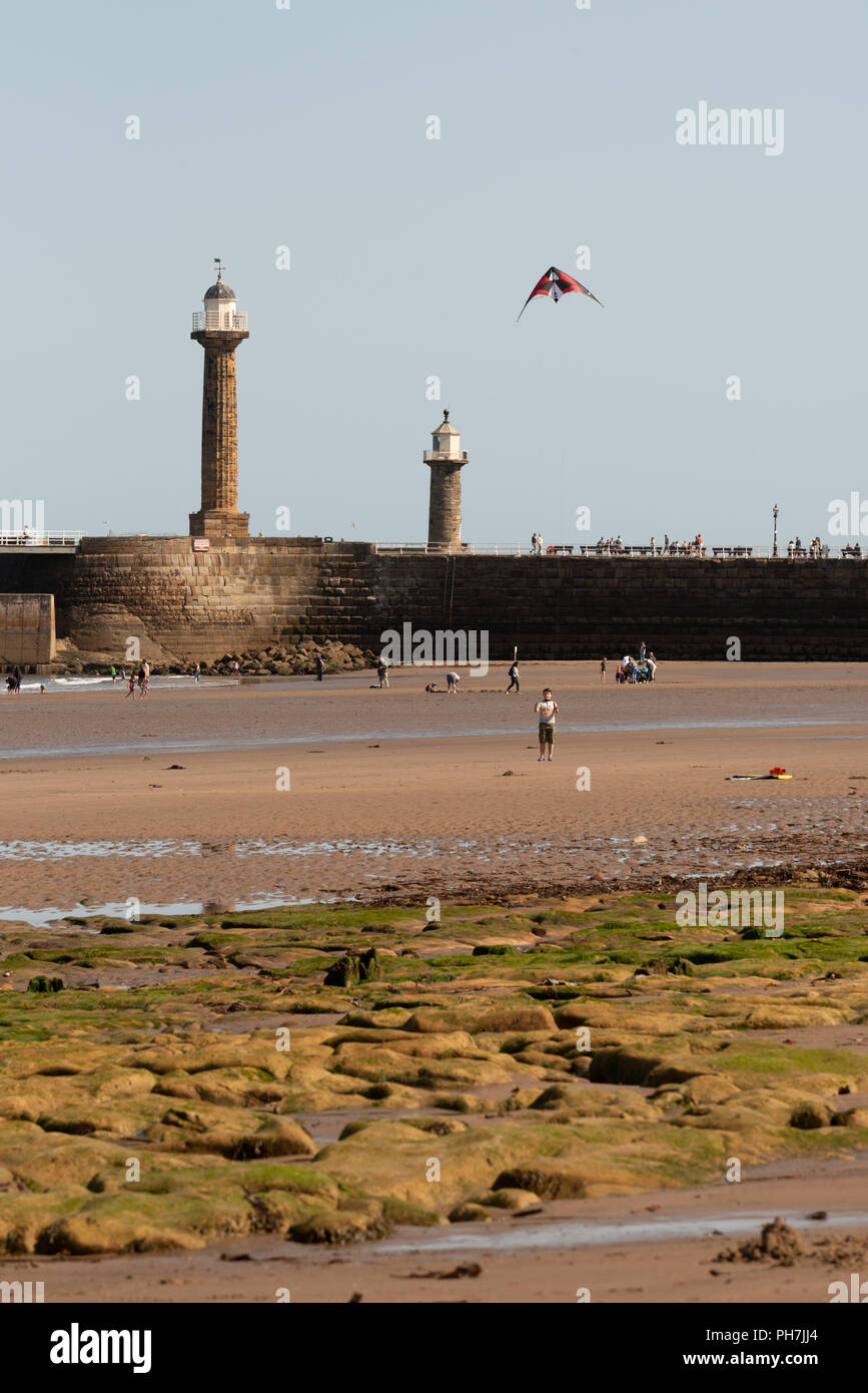 Whitby Sands, Whitby, United Kingdom. 31st August 2018. Young child ...