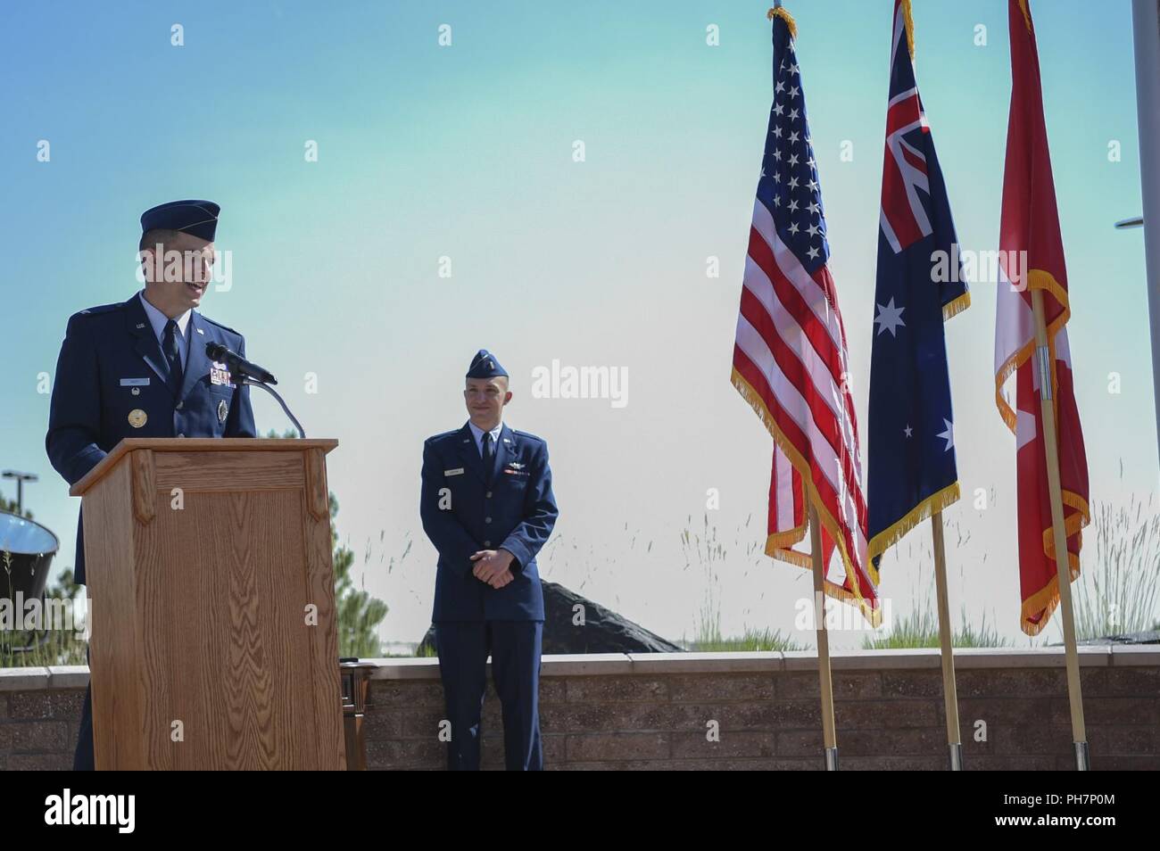 Col. Robert Hutt, 460th Operations Group commander, provides remarks to ...